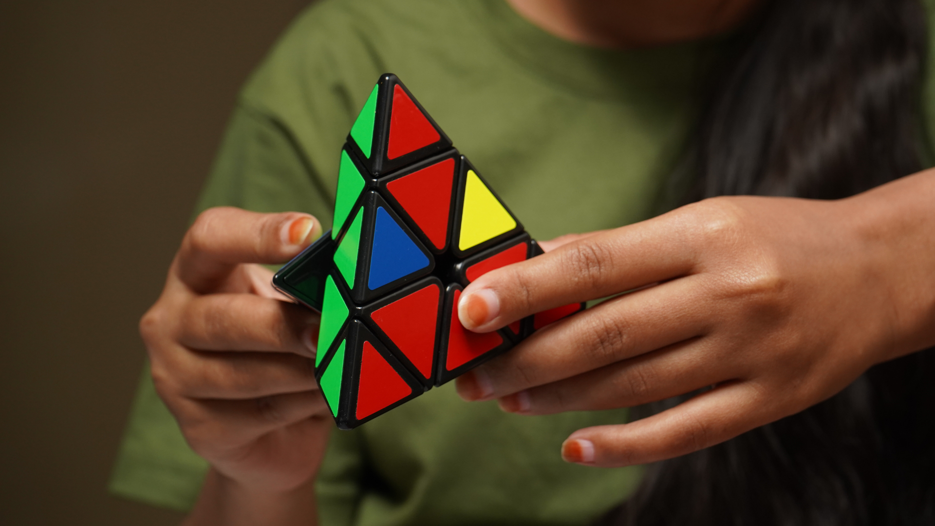 The Science Behind the Pyraminx / Triangle Rubik’s Cube: Geometry, Alg